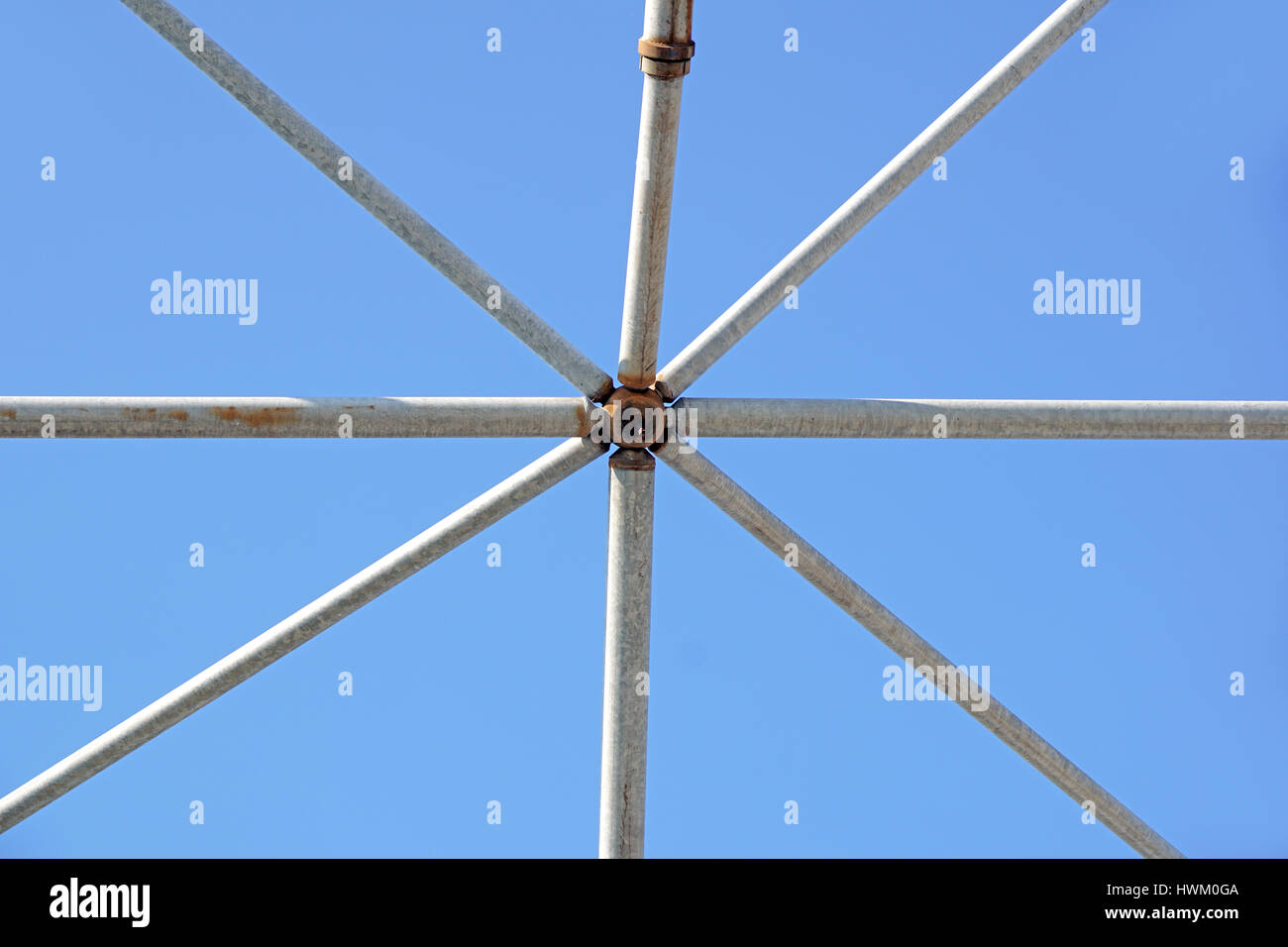 metal structure with blue sky background Stock Photo - Alamy