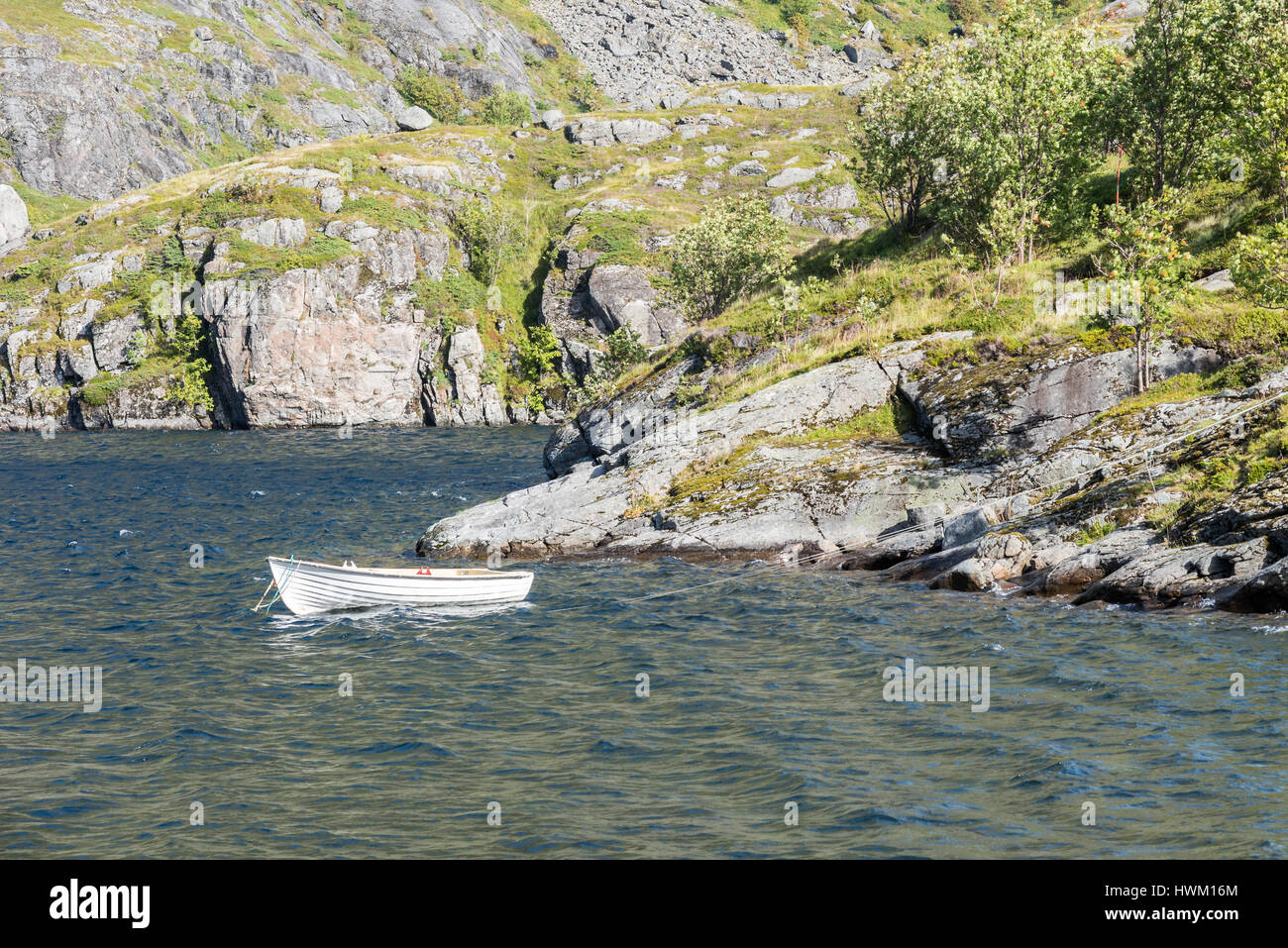 Rowing boat in rough sea Stock Photo - Alamy