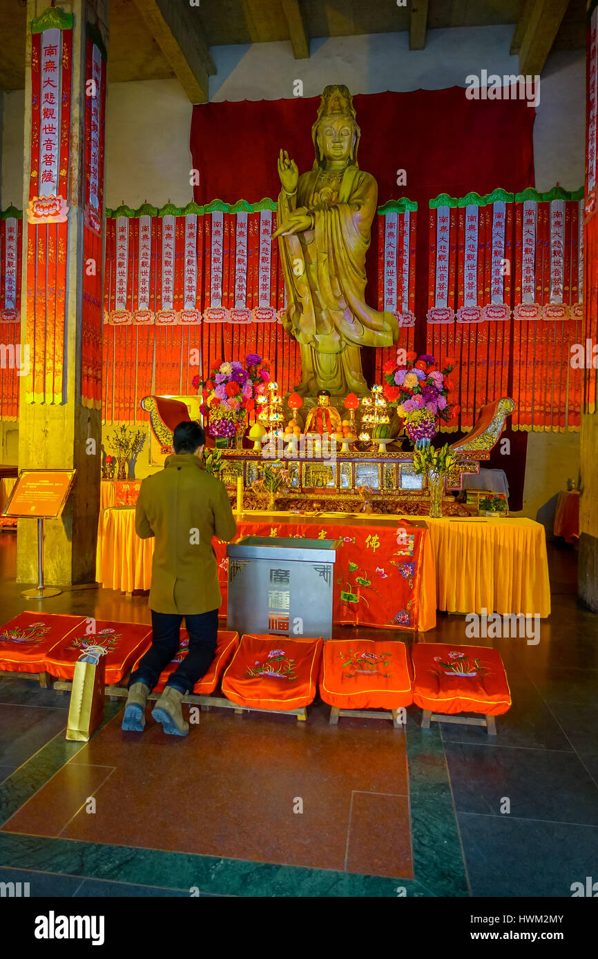 SHANGHAI, CHINA - 29 JANUARY, 2017: Religious alter in yellow and red ...