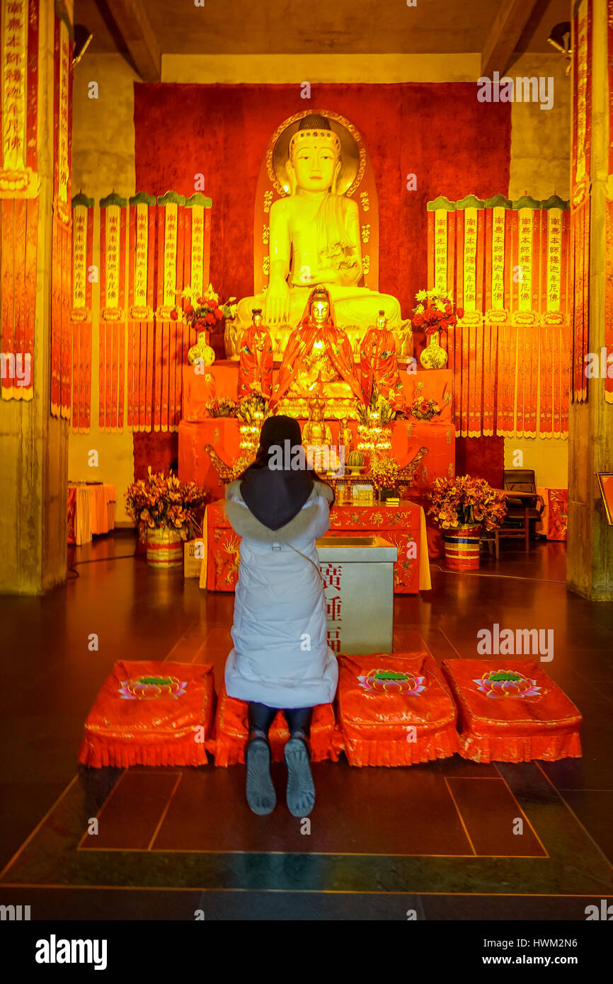 SHANGHAI, CHINA - 29 JANUARY, 2017: Religious alter in yellow and red ...