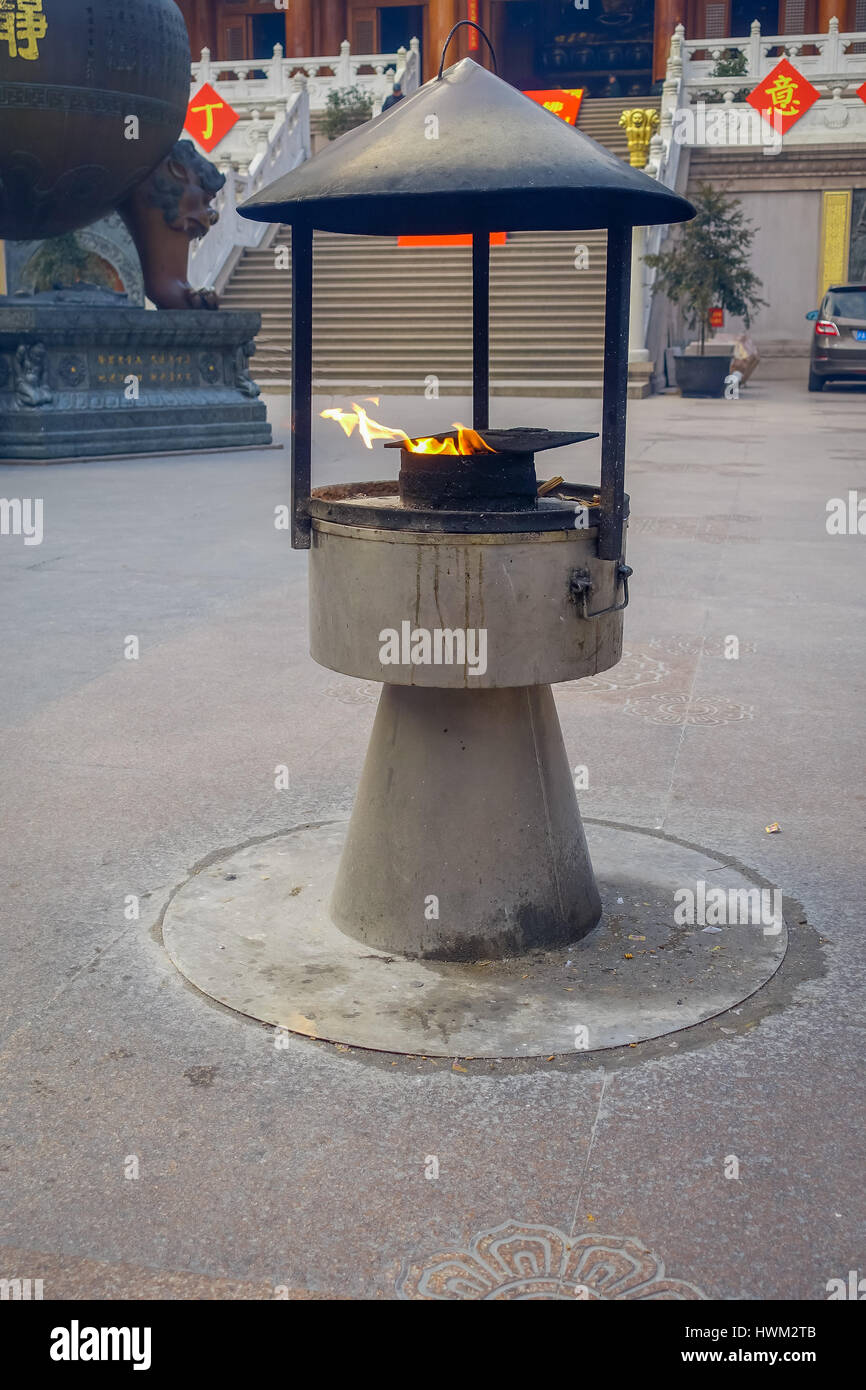 SHANGHAI, CHINA: Nice traditional metal lantern with open fire inside ...