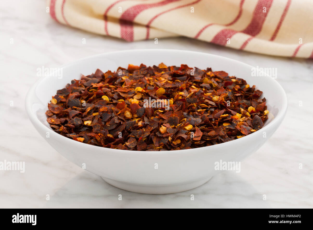 dried red hot pepper flakes spicy and delicious Stock Photo - Alamy