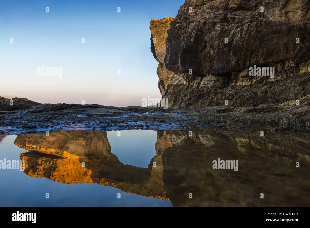 Gozo, Malta - Sunriseat the beautiful Azure Window, a natural arch and ...