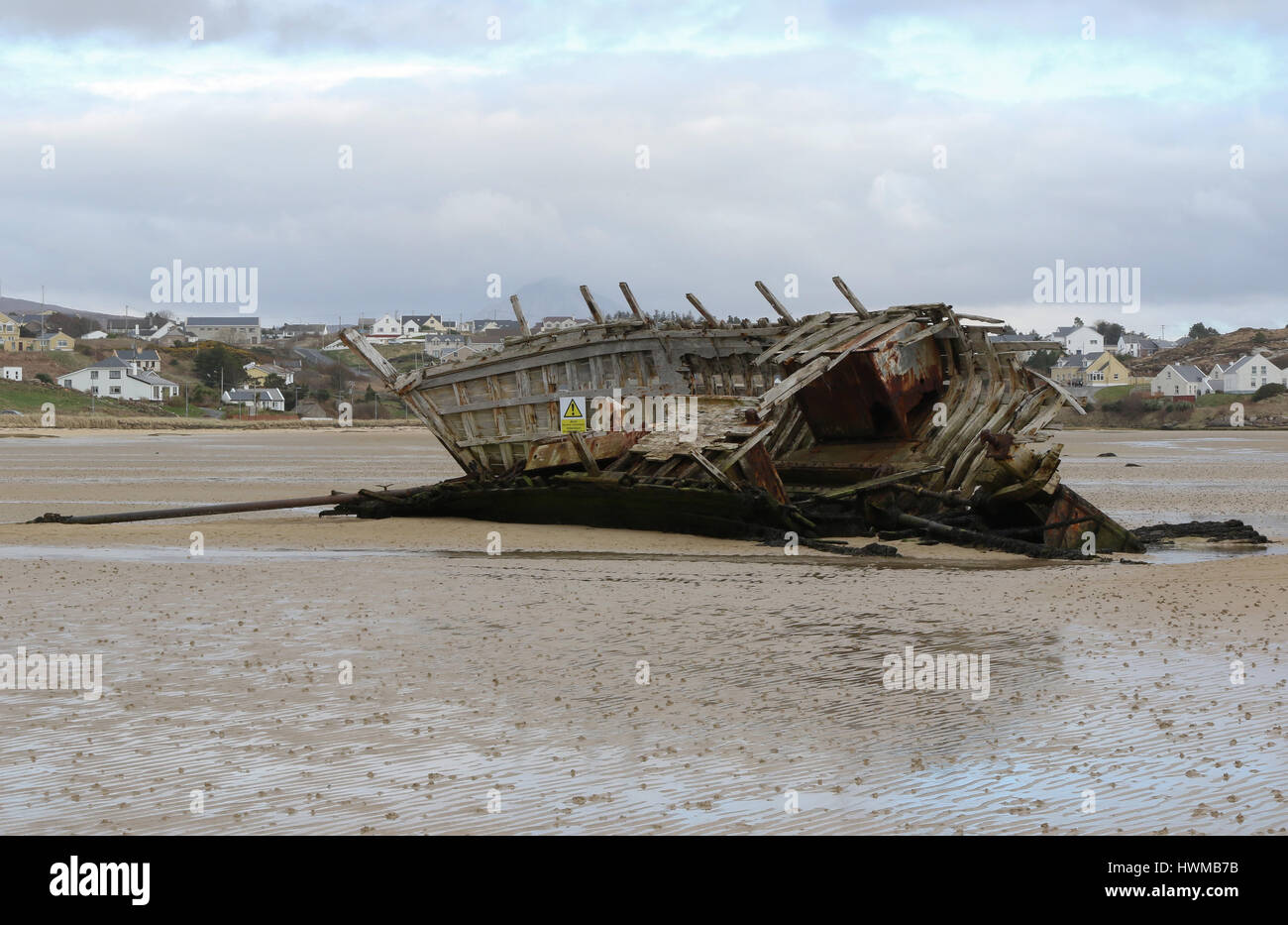 The wreck of a wooden fishing boat at Bunbeg, County Donegal, Ireland ...