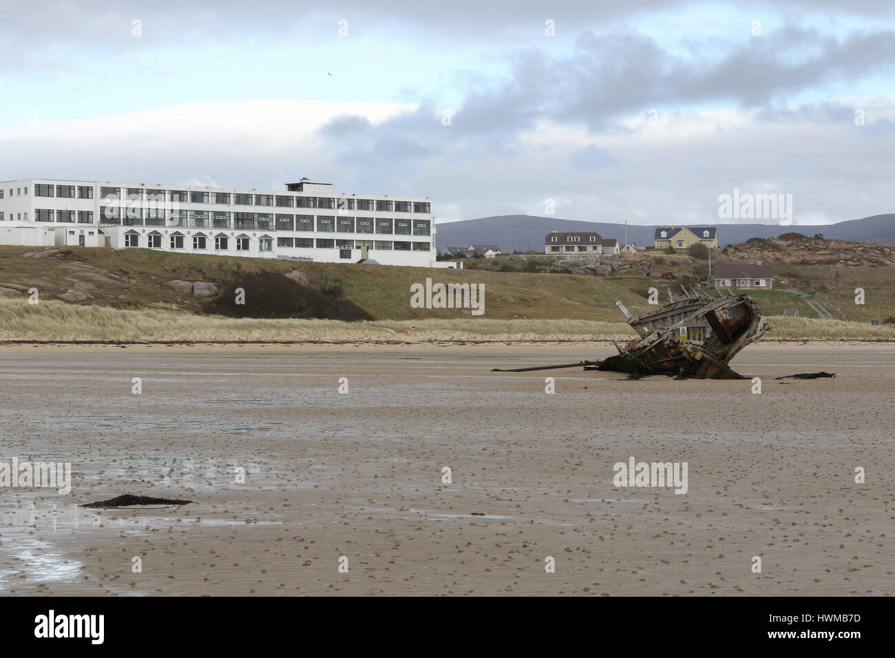 The wreck of a wooden fishing boat at Bunbeg, County Donegal, Ireland ...