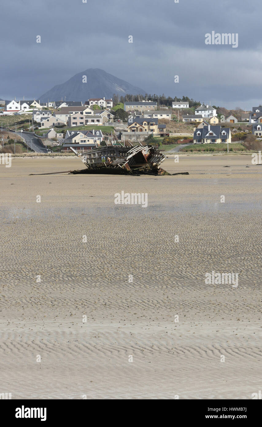The wreck of a wooden fishing boat at Bunbeg, County Donegal, Ireland ...