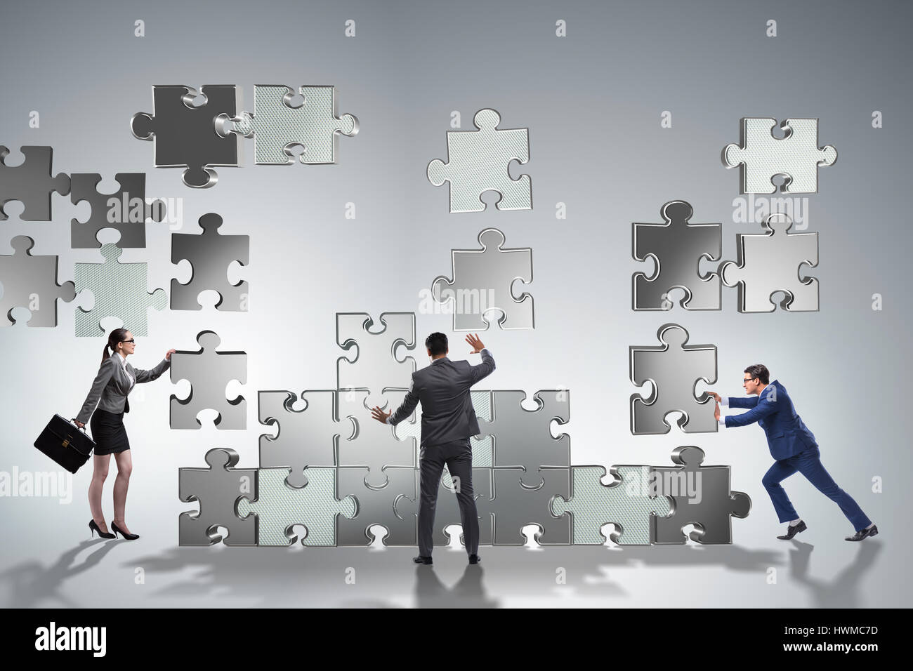 Business concept of teamwork with puzzle pieces Stock Photo - Alamy