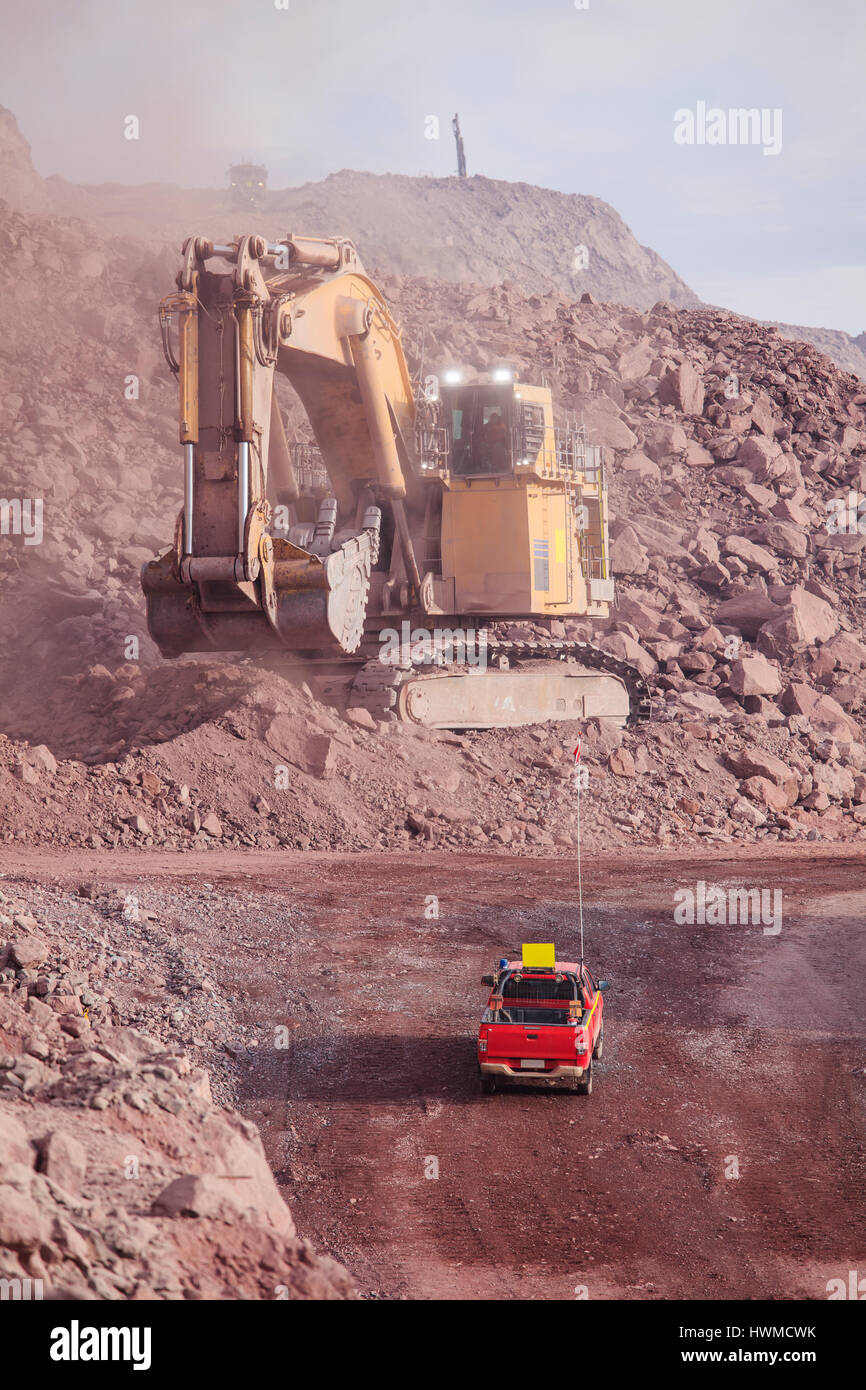 Big shovel loading of copper ore near to pickup truck Stock Photo - Alamy