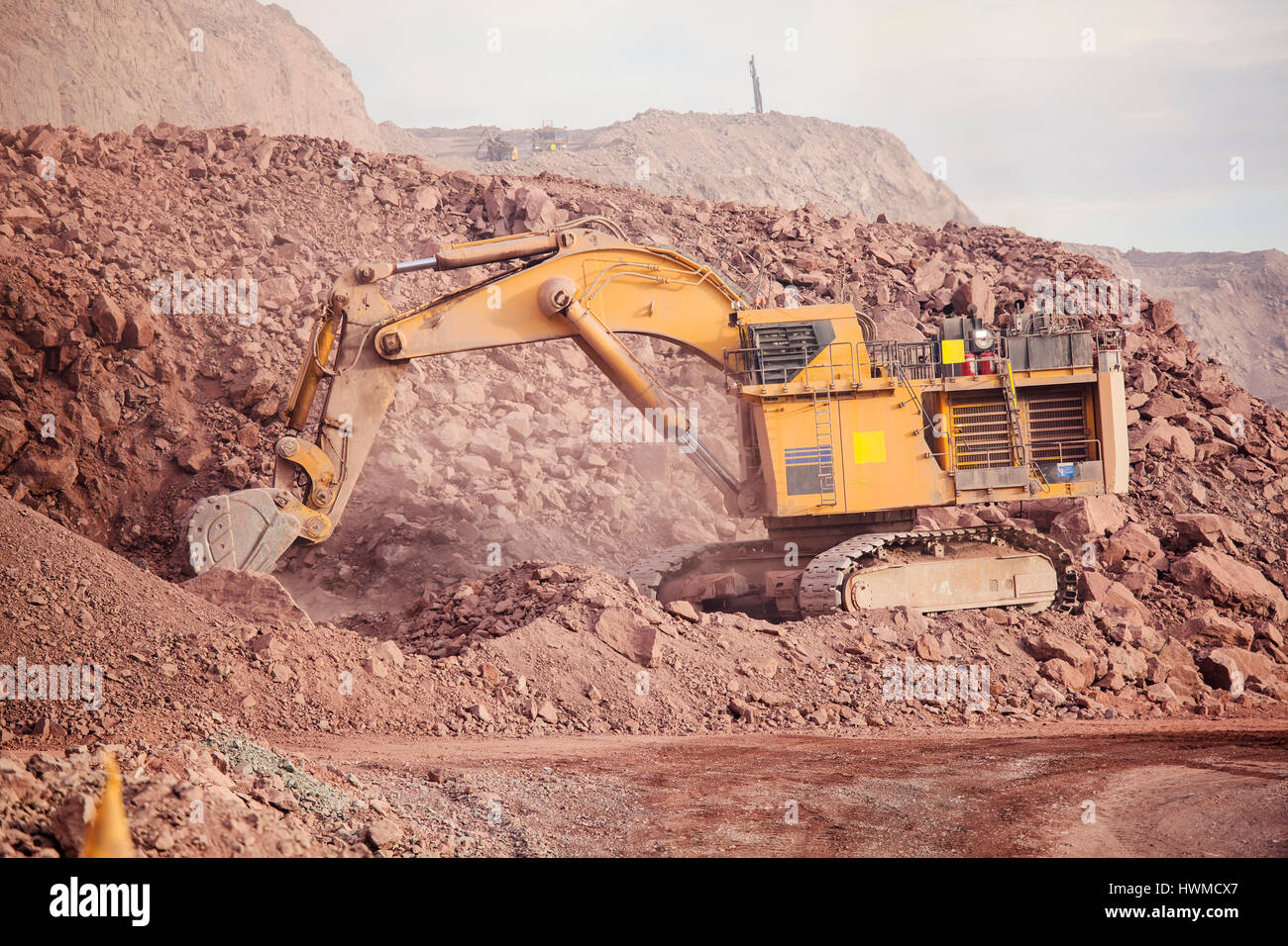 Big shovel loading of copper ore Stock Photo - Alamy