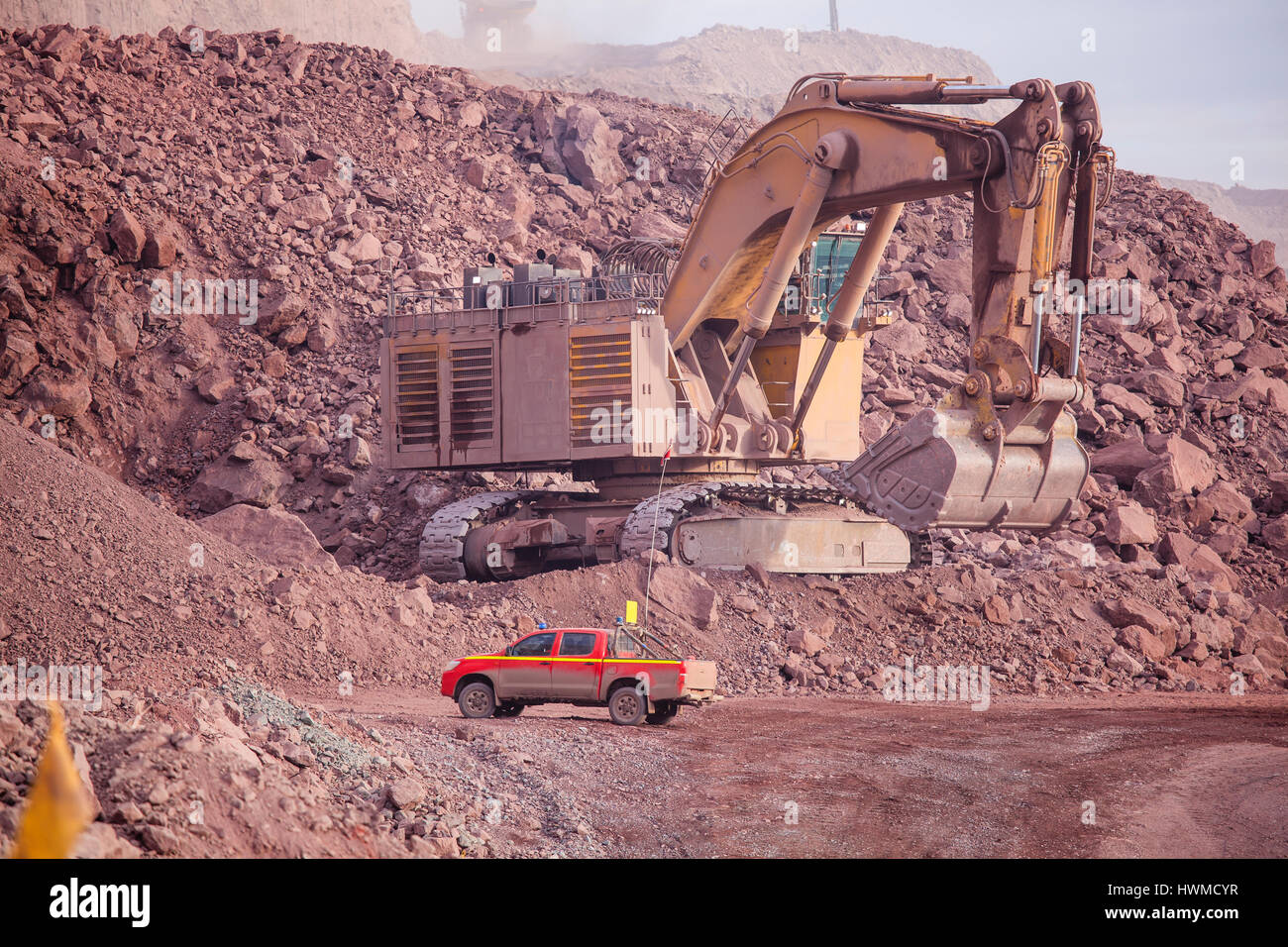 Big shovel loading of copper ore near to pickup truck Stock Photo - Alamy