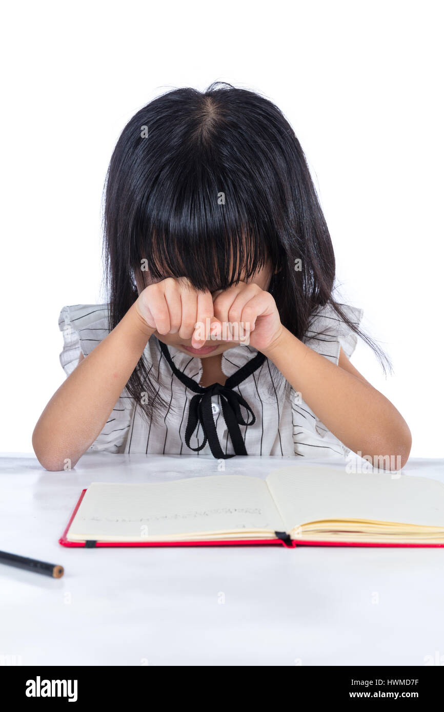 Boring Asian Chinese little office lady writing book in isolated white ...
