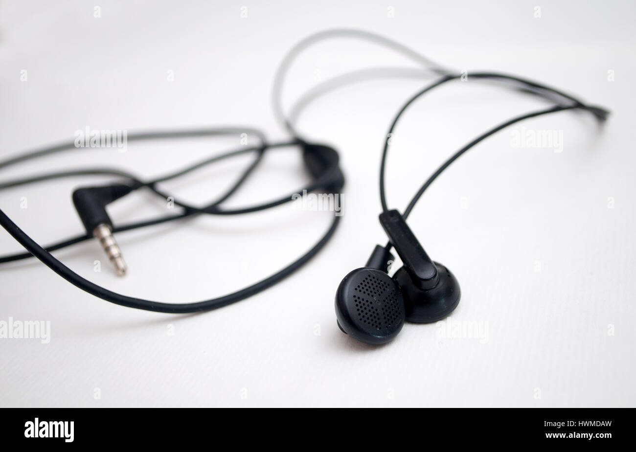 Ordinary black headphones Stock Photo - Alamy