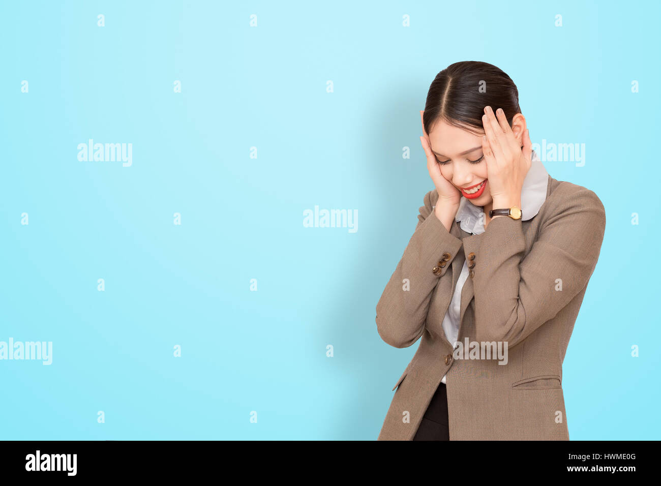 Business woman face embarrassed smile Stock Photo - Alamy