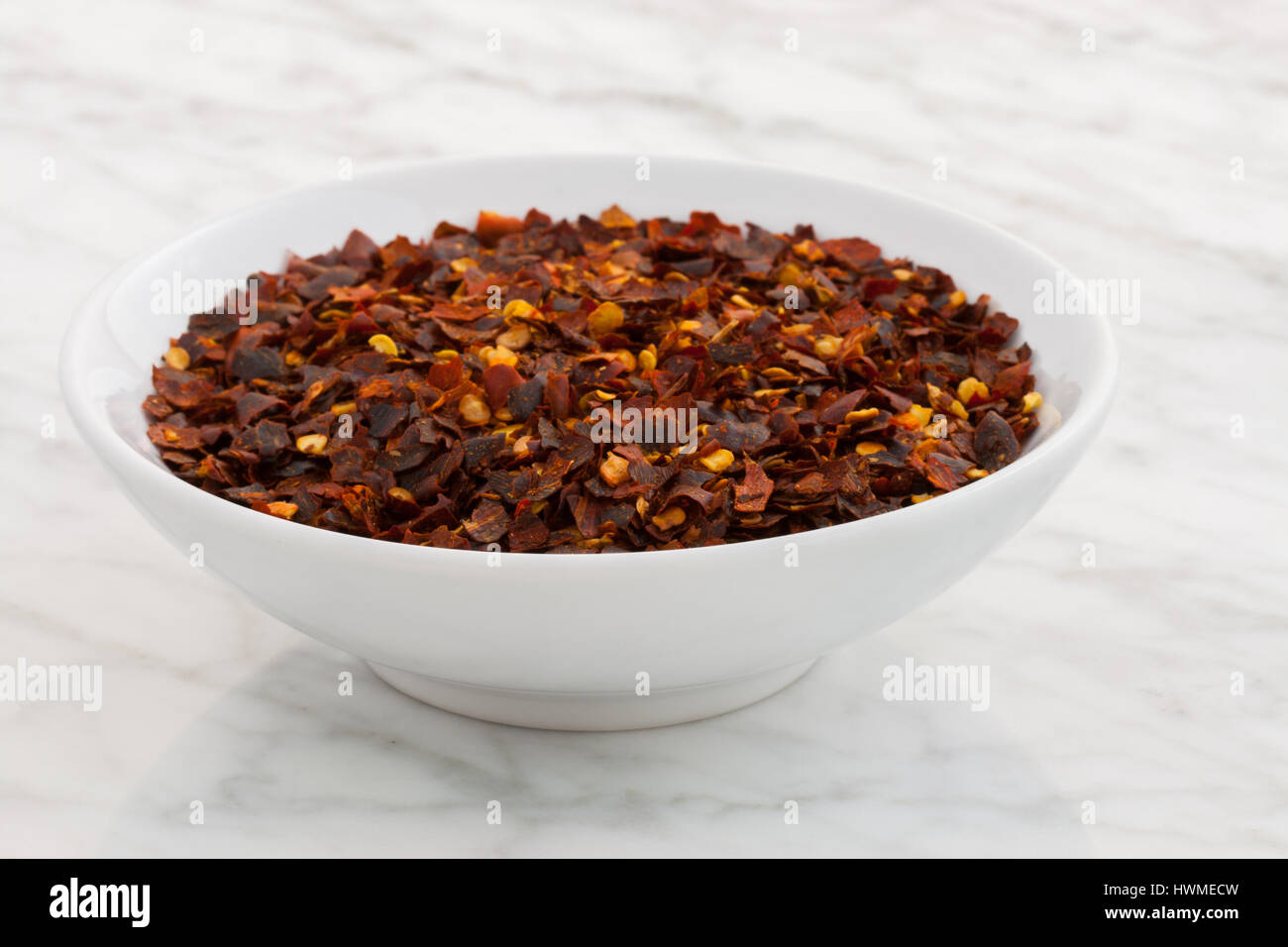 dried red hot pepper flakes spicy and delicious Stock Photo - Alamy