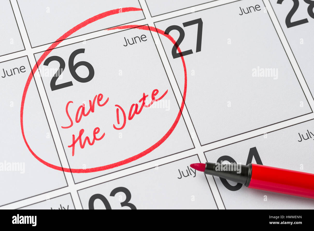Save the Date written on a calendar - June 26 Stock Photo - Alamy