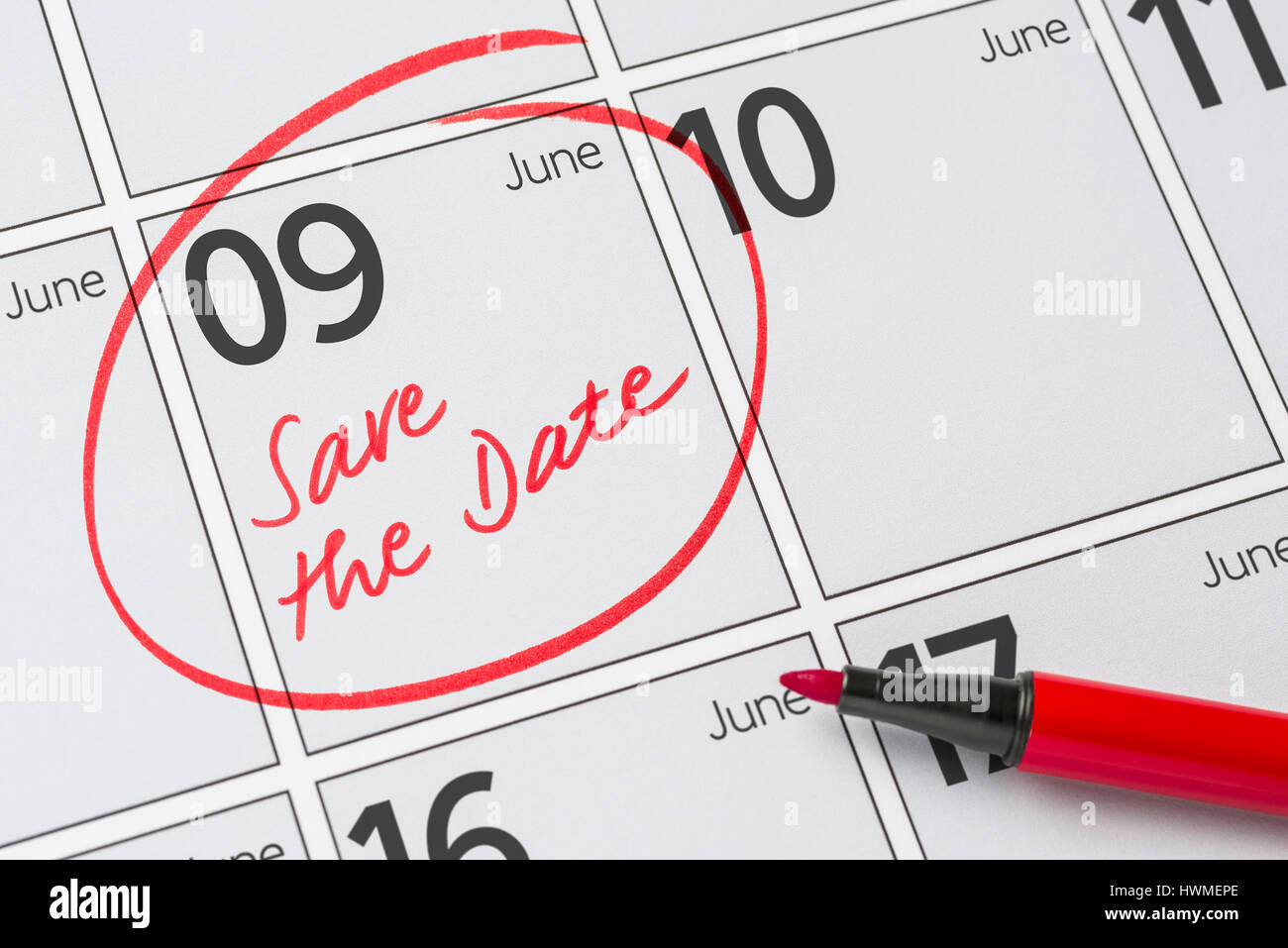 Save the Date written on a calendar - June 09 Stock Photo - Alamy
