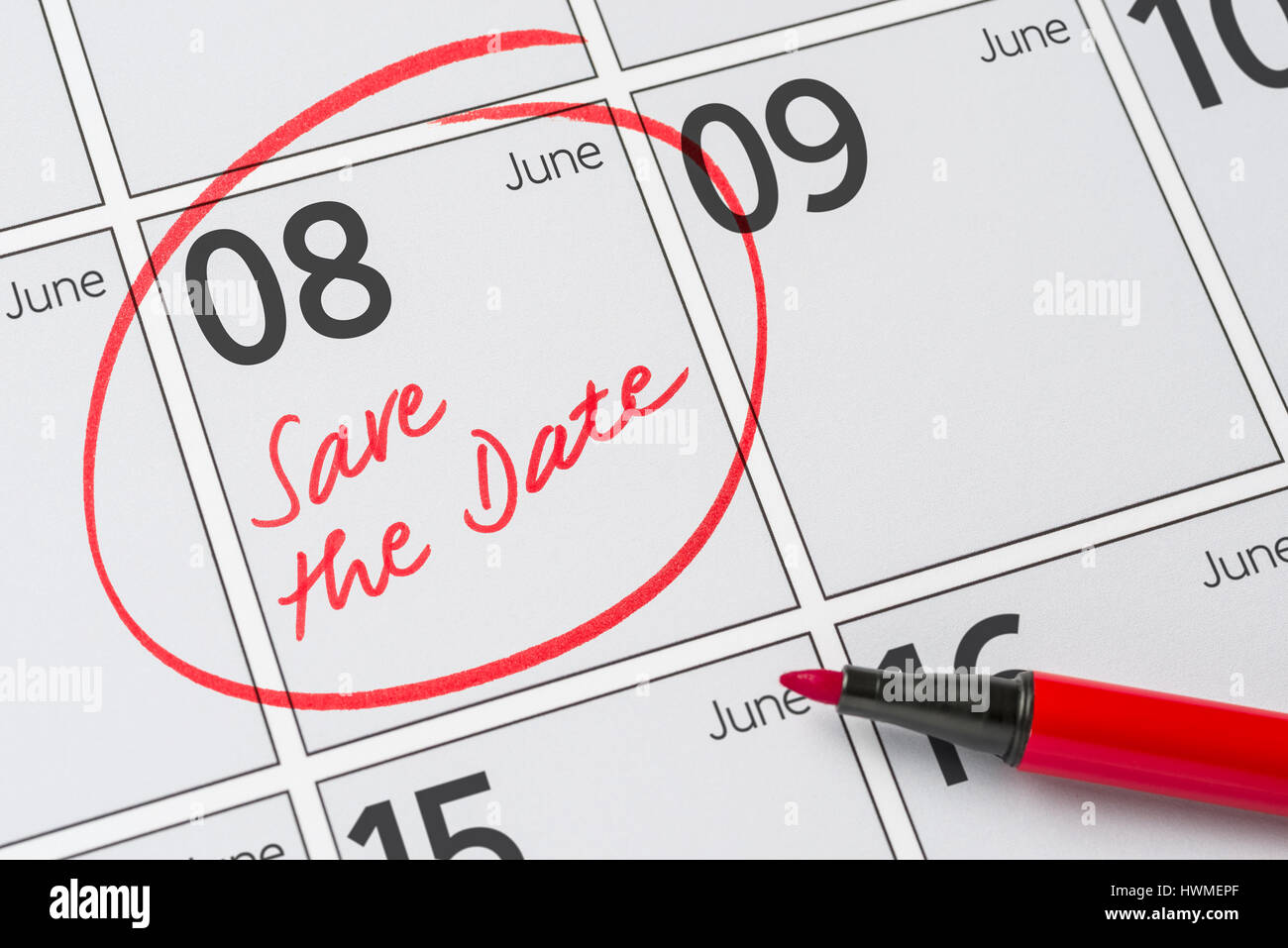 Save the Date written on a calendar - June 08 Stock Photo - Alamy