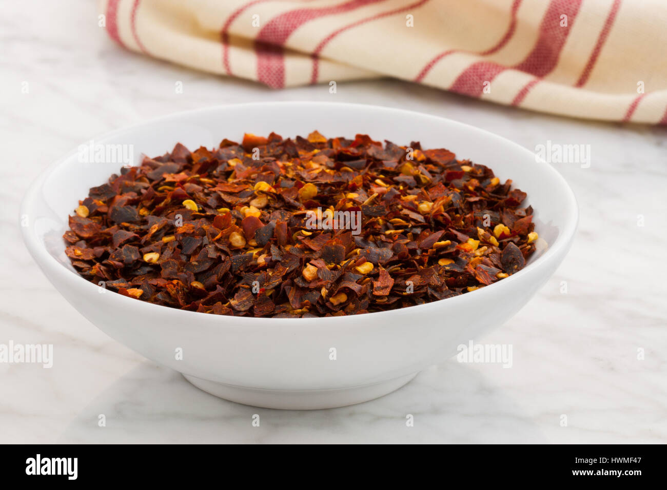 dried red hot pepper flakes spicy and delicious Stock Photo - Alamy