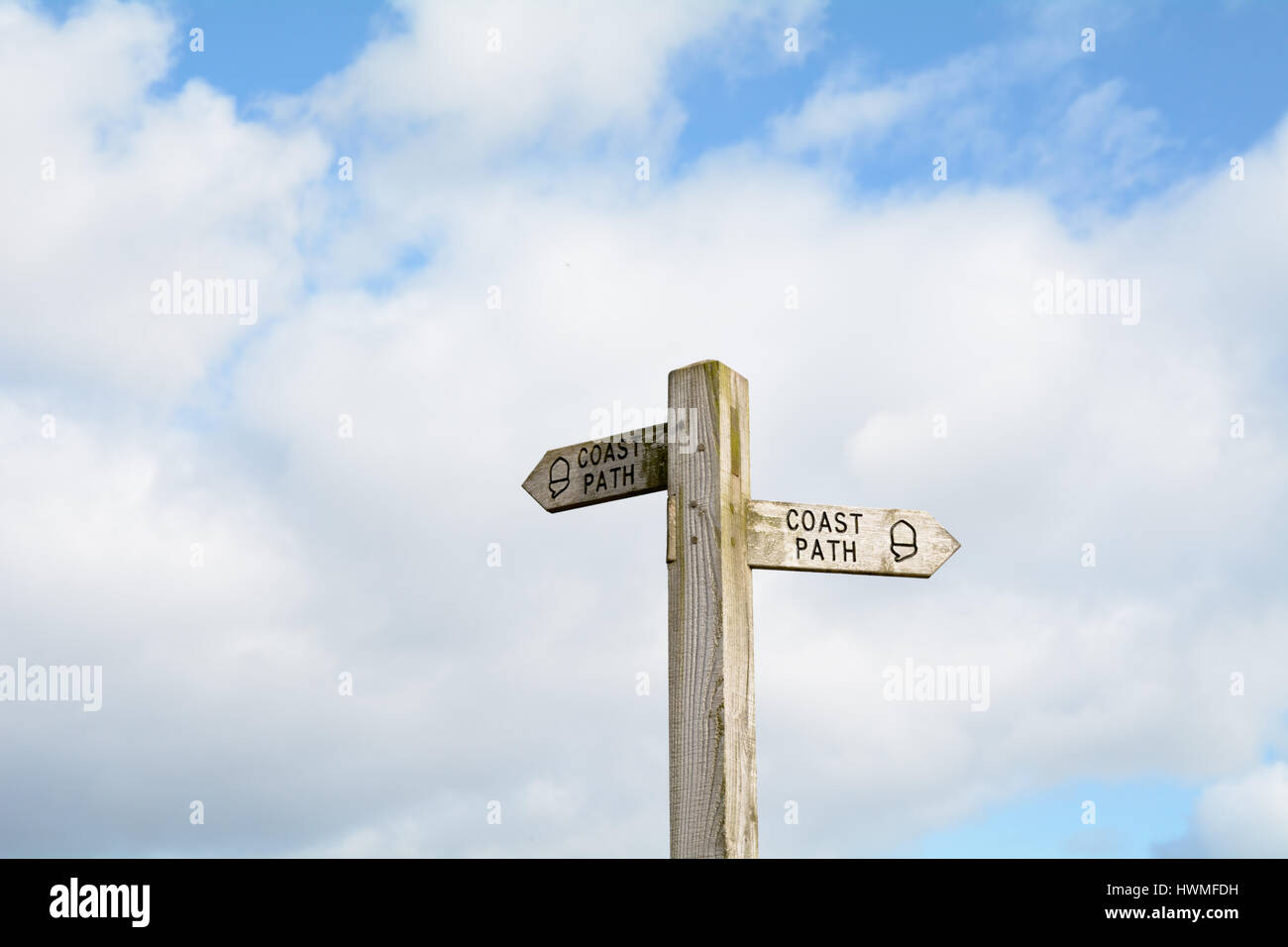 South West Coast Path wooden sign with direction arrows in Shaldon ...