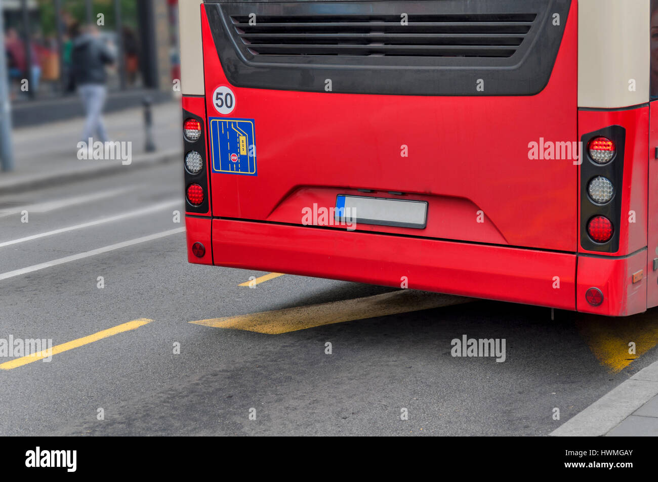 Back of red city bus Stock Photo - Alamy