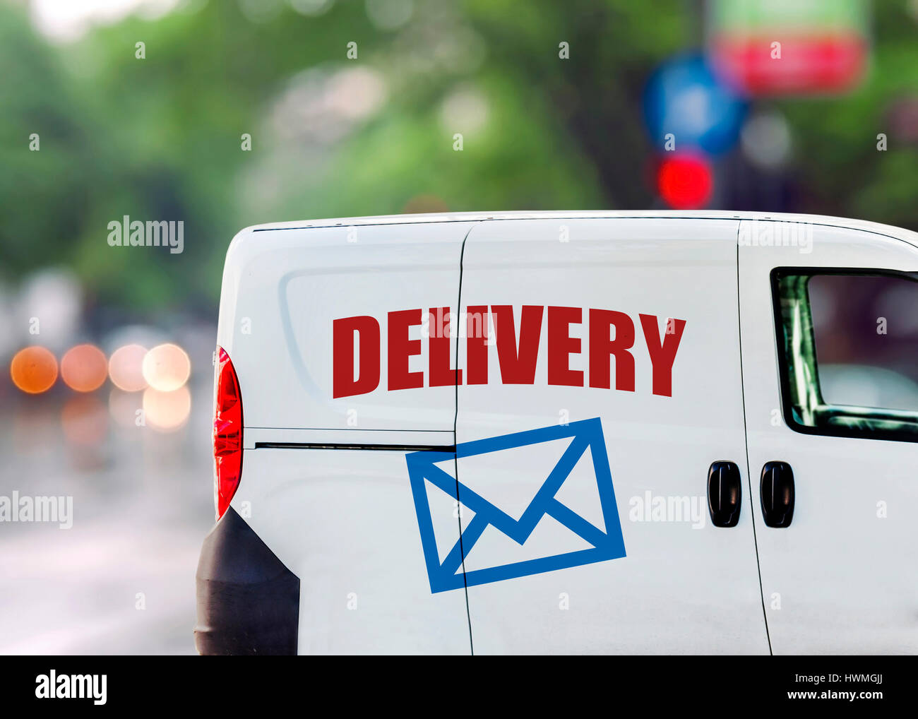 Free delivery, van on city street Stock Photo - Alamy