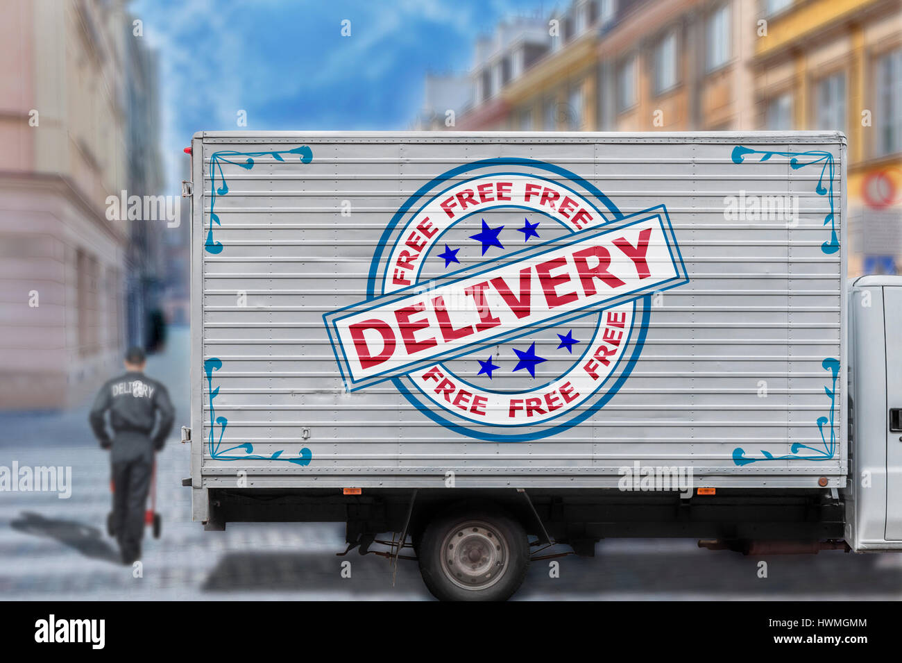 Free delivery truck in the city centar Stock Photo - Alamy