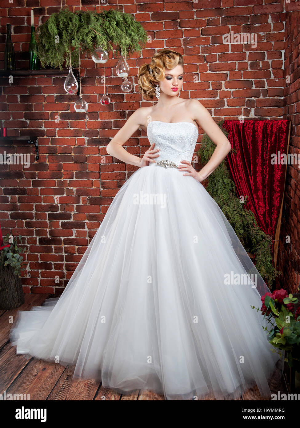 portrait of blonde bride in interior Stock Photo - Alamy