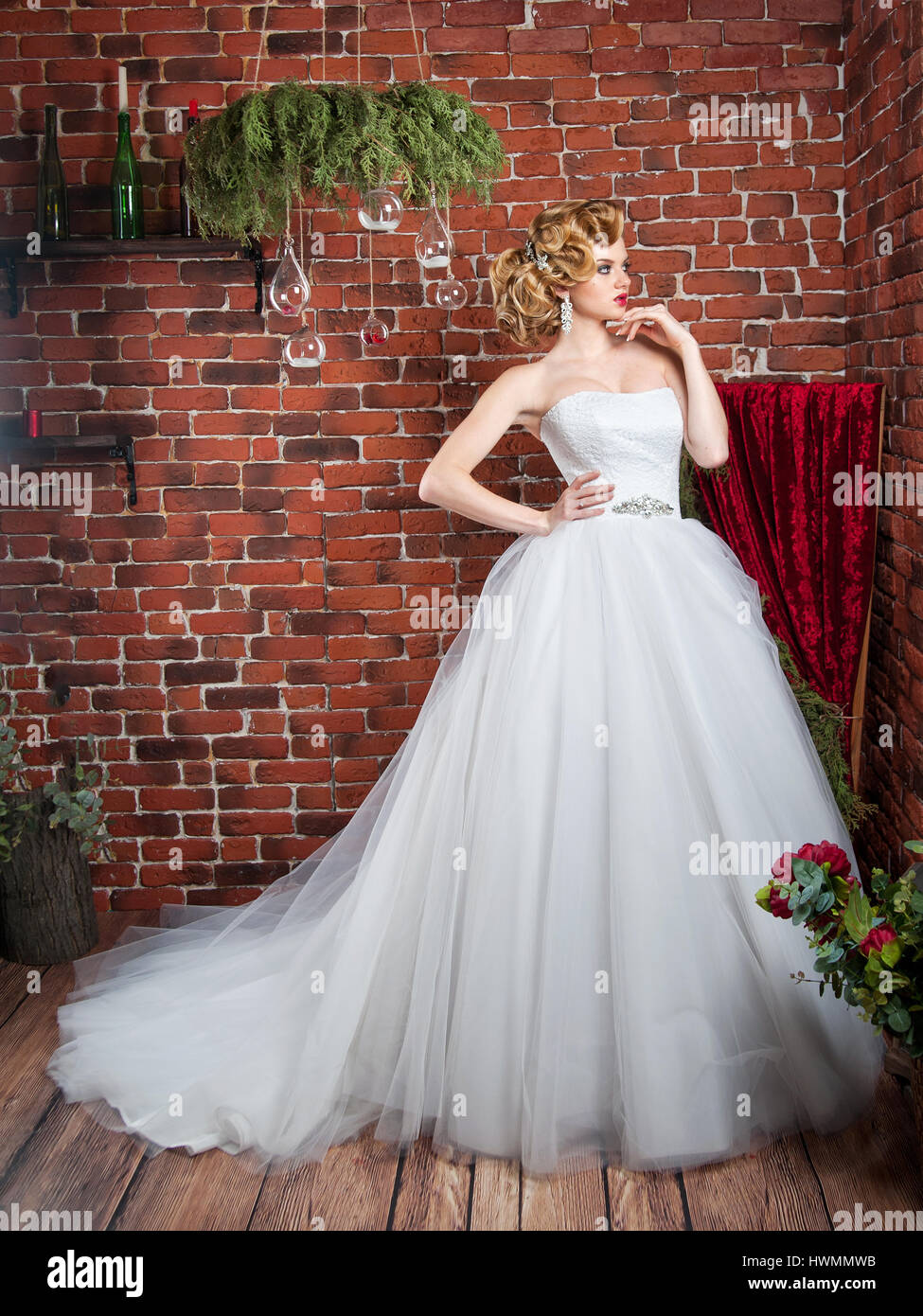 portrait of blonde bride in interior Stock Photo - Alamy