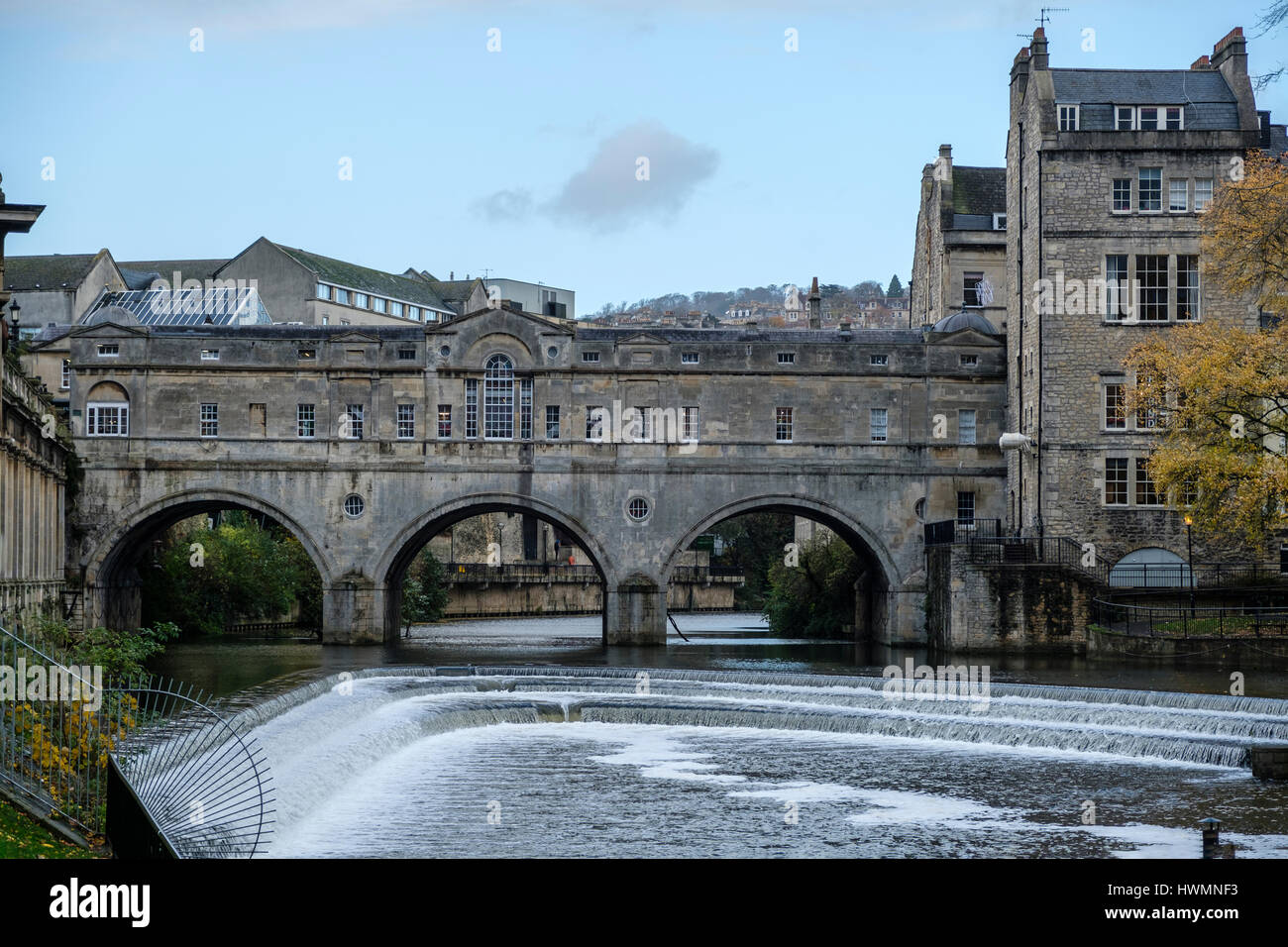 The iconic Pulteney Bridge over the River Avon in Bath England with ...