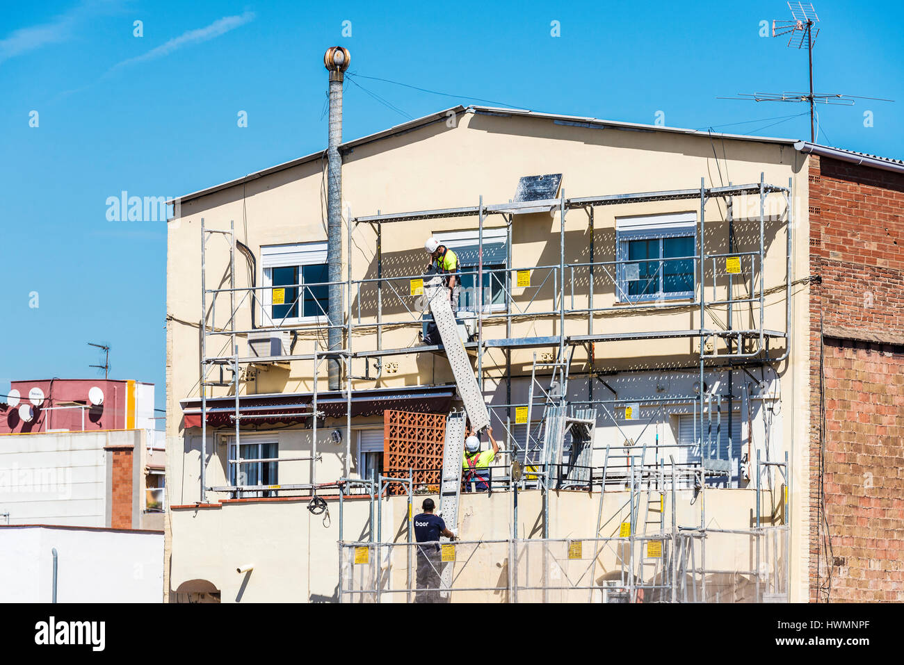 Barcelona, Spain - March 20, 2017: Construction workers working on ...