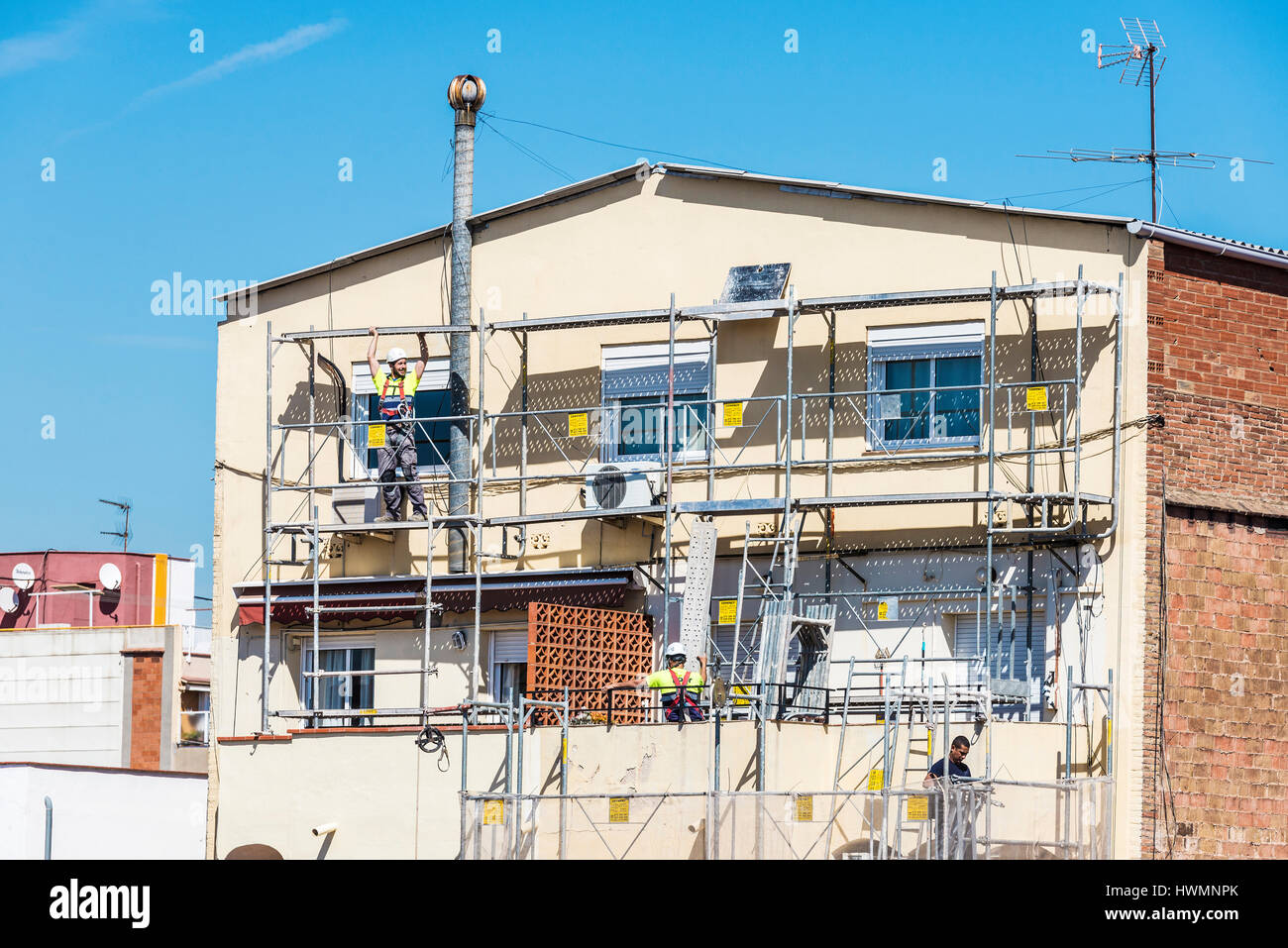 Barcelona, Spain - March 20, 2017: Construction workers working on ...