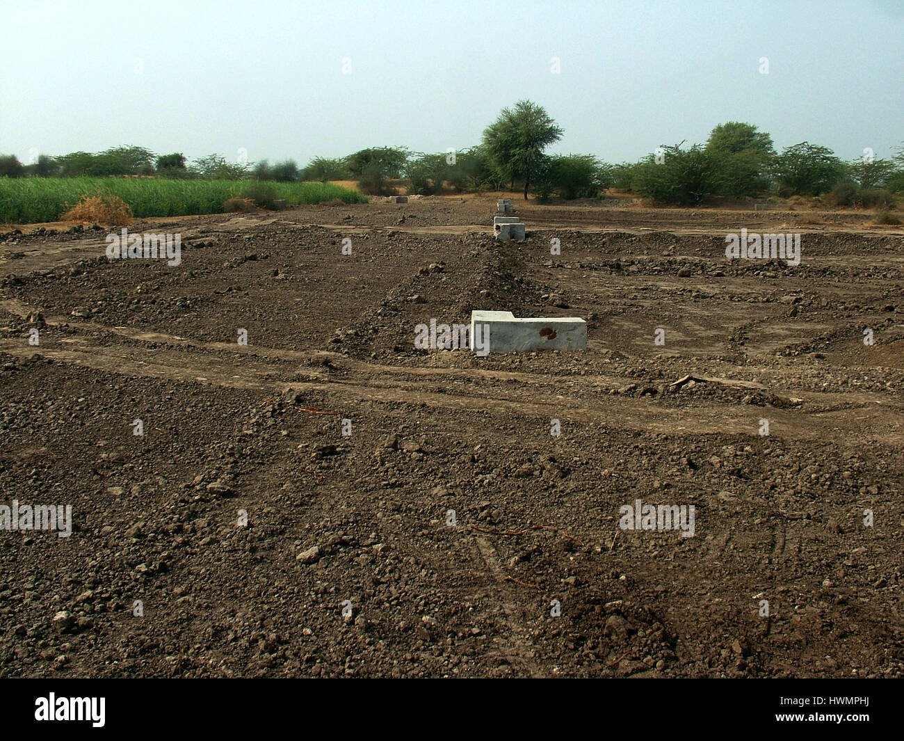 Tractor at Paddy land, developing, agricultural land (Copyright © Saji ...