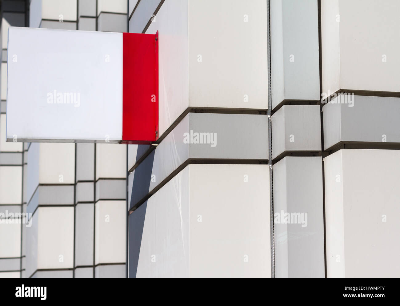 horizontal side view of empty white square signage on the exterior of a ...