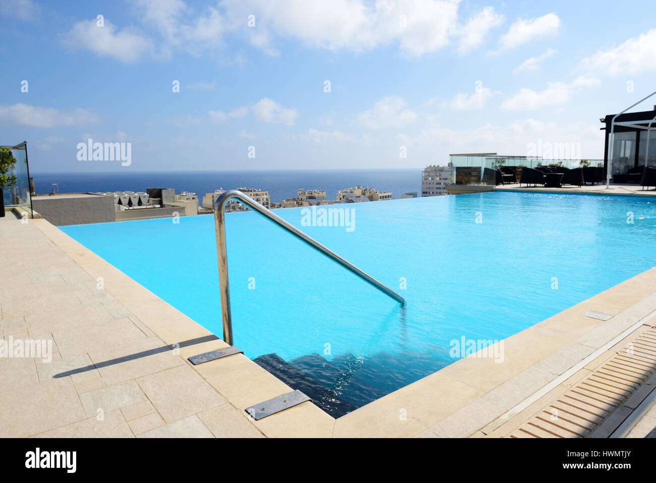 The swimming pool on the top of building of luxury hotel, Malta Stock ...