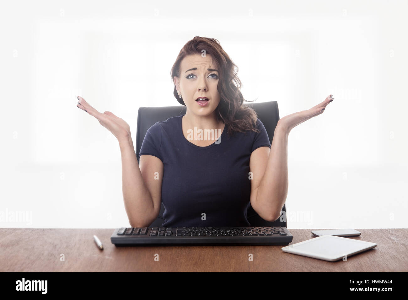 Shocked employee sitting desk hi-res stock photography and images - Alamy