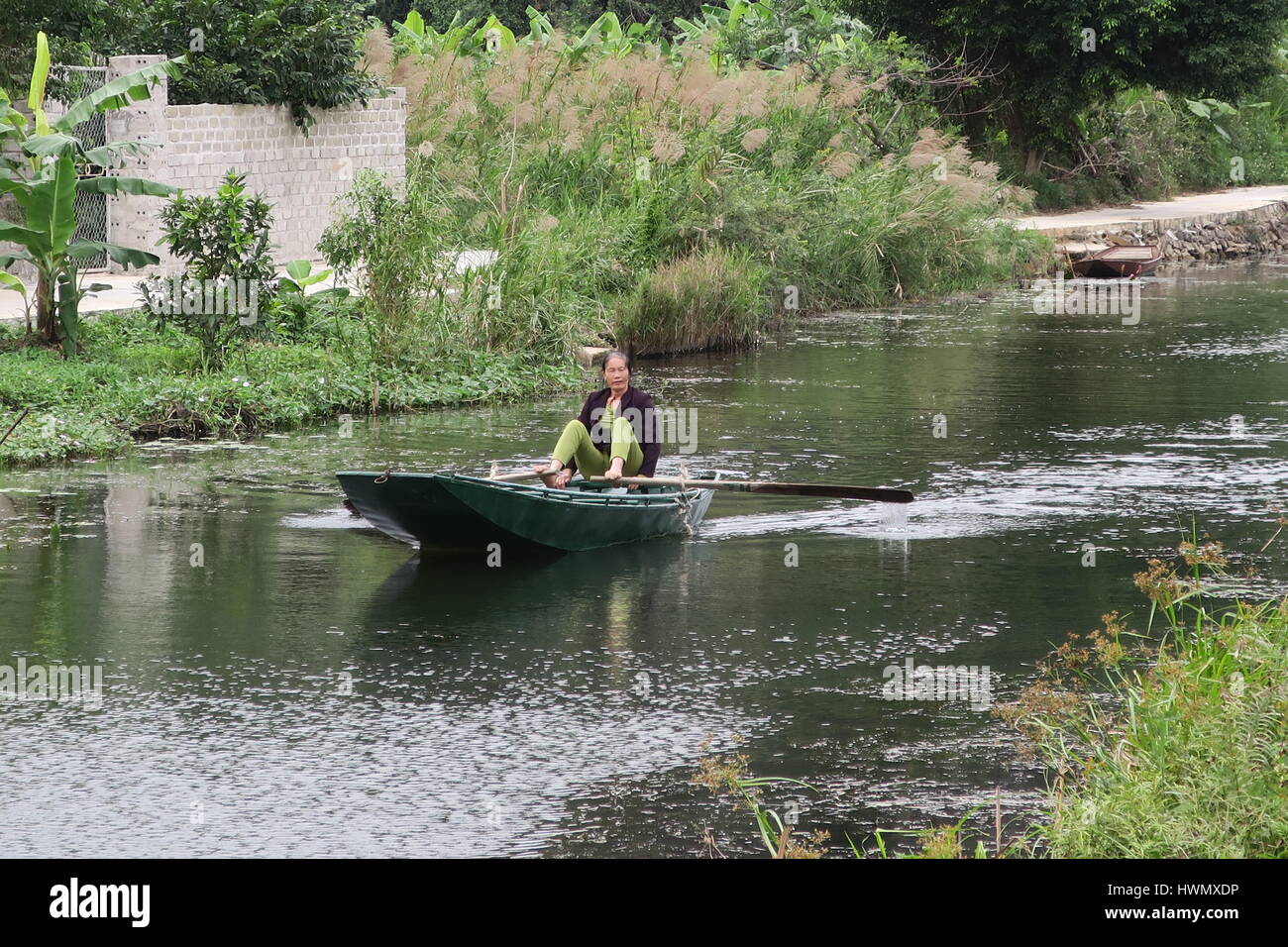 Calm stream in Vietnam, beautiful landscape, native wooden boat for ...