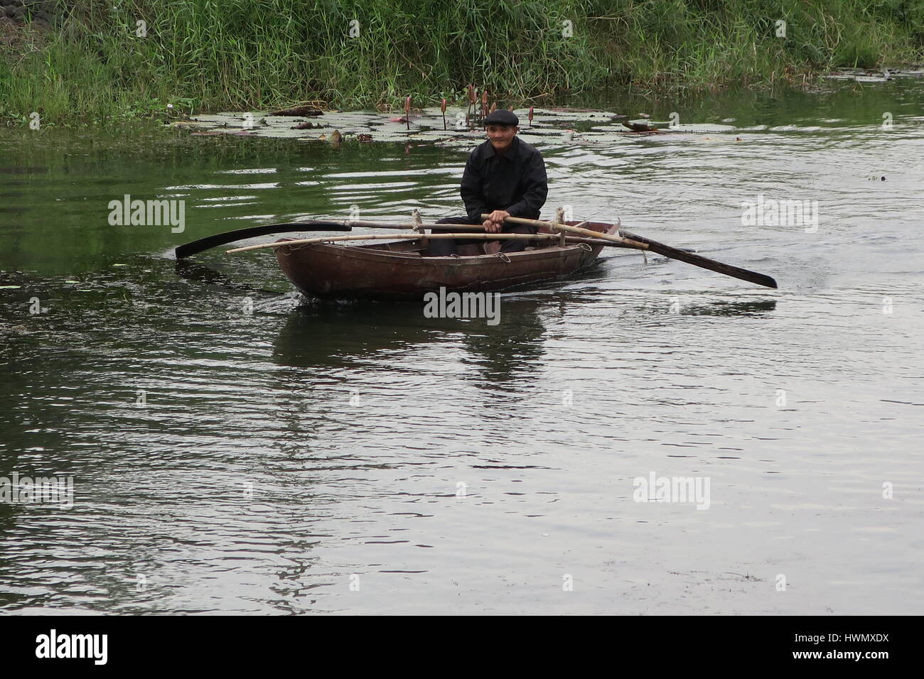 Calm stream in Vietnam, beautiful landscape, native wooden boat for ...