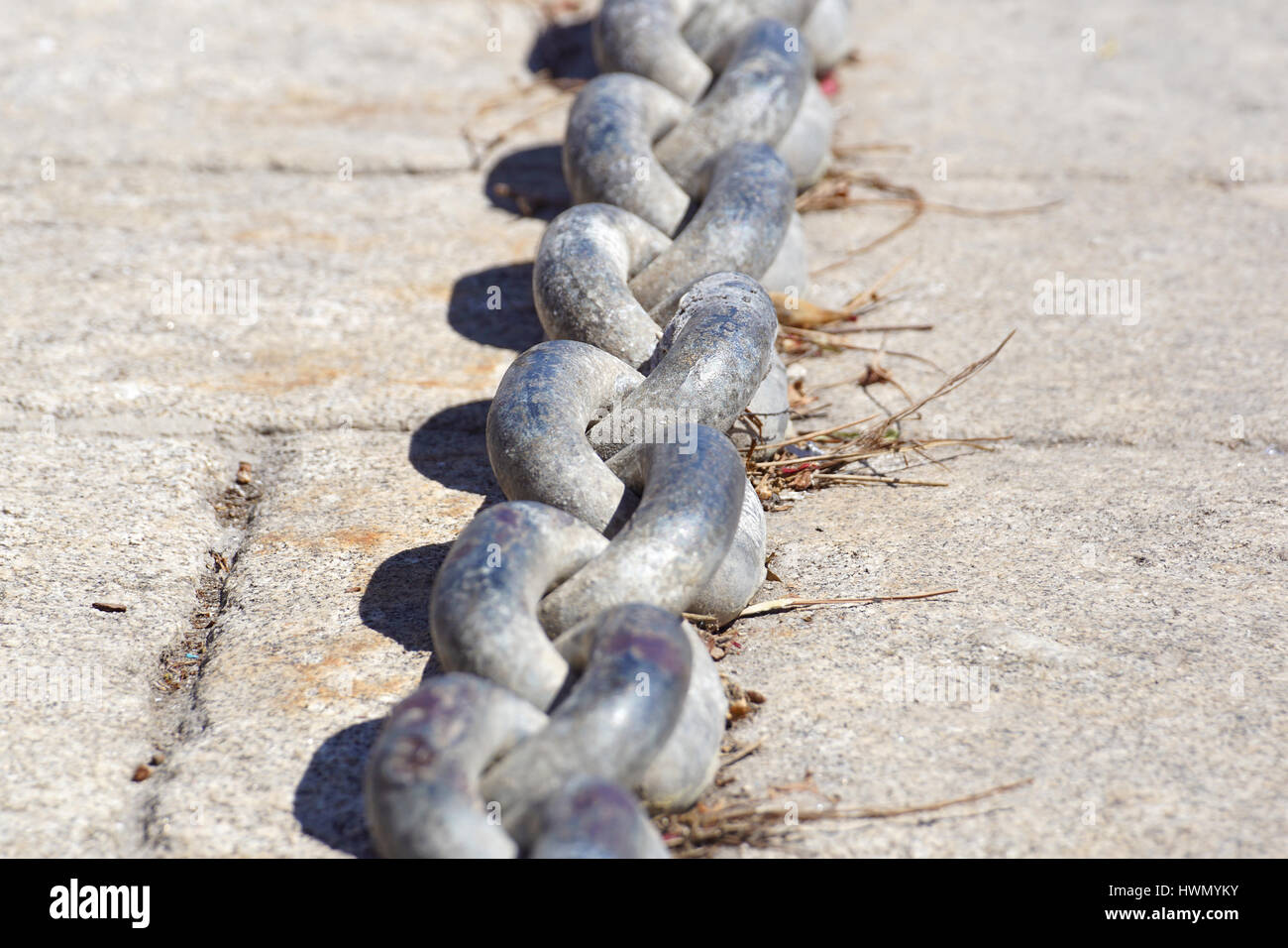 nautical anchor chains on the pier Stock Photo - Alamy