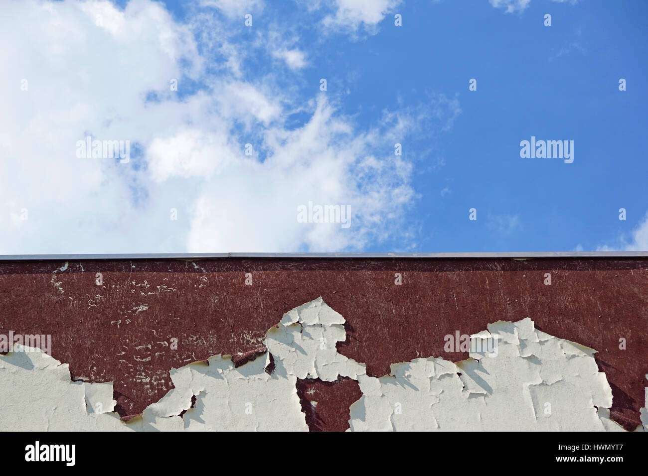 damaged wall detail and blue sky Stock Photo - Alamy