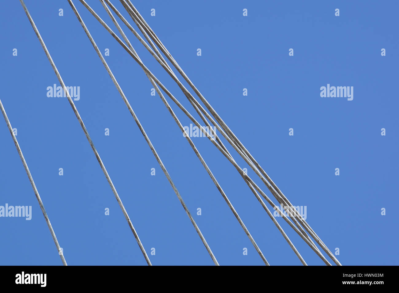 metal rods with blue sky in background Stock Photo - Alamy