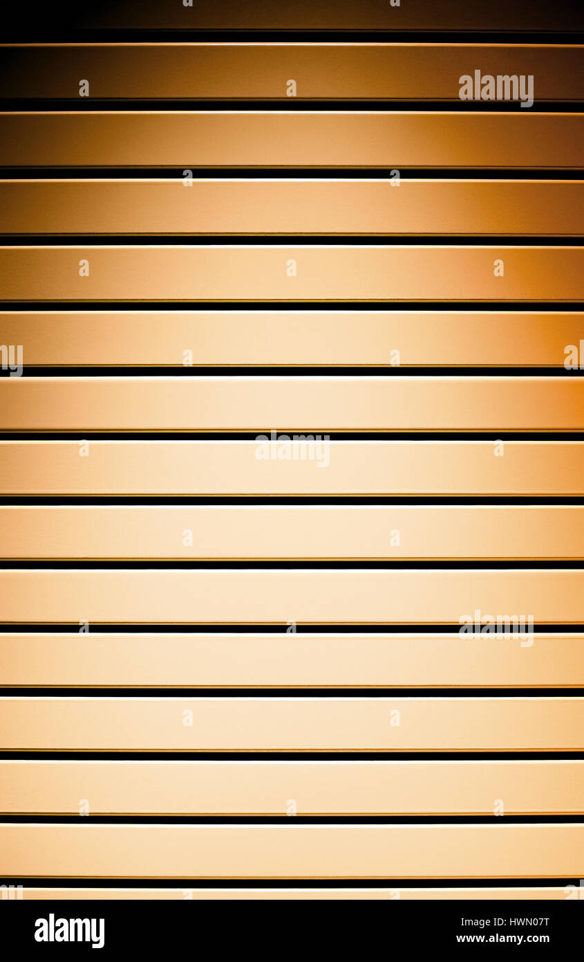 golden panel background with single spotlight effect Stock Photo - Alamy