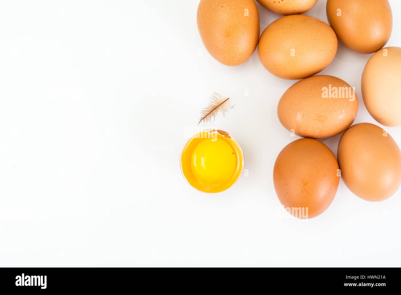 Broken eggs, separation of yolk Stock Photo - Alamy