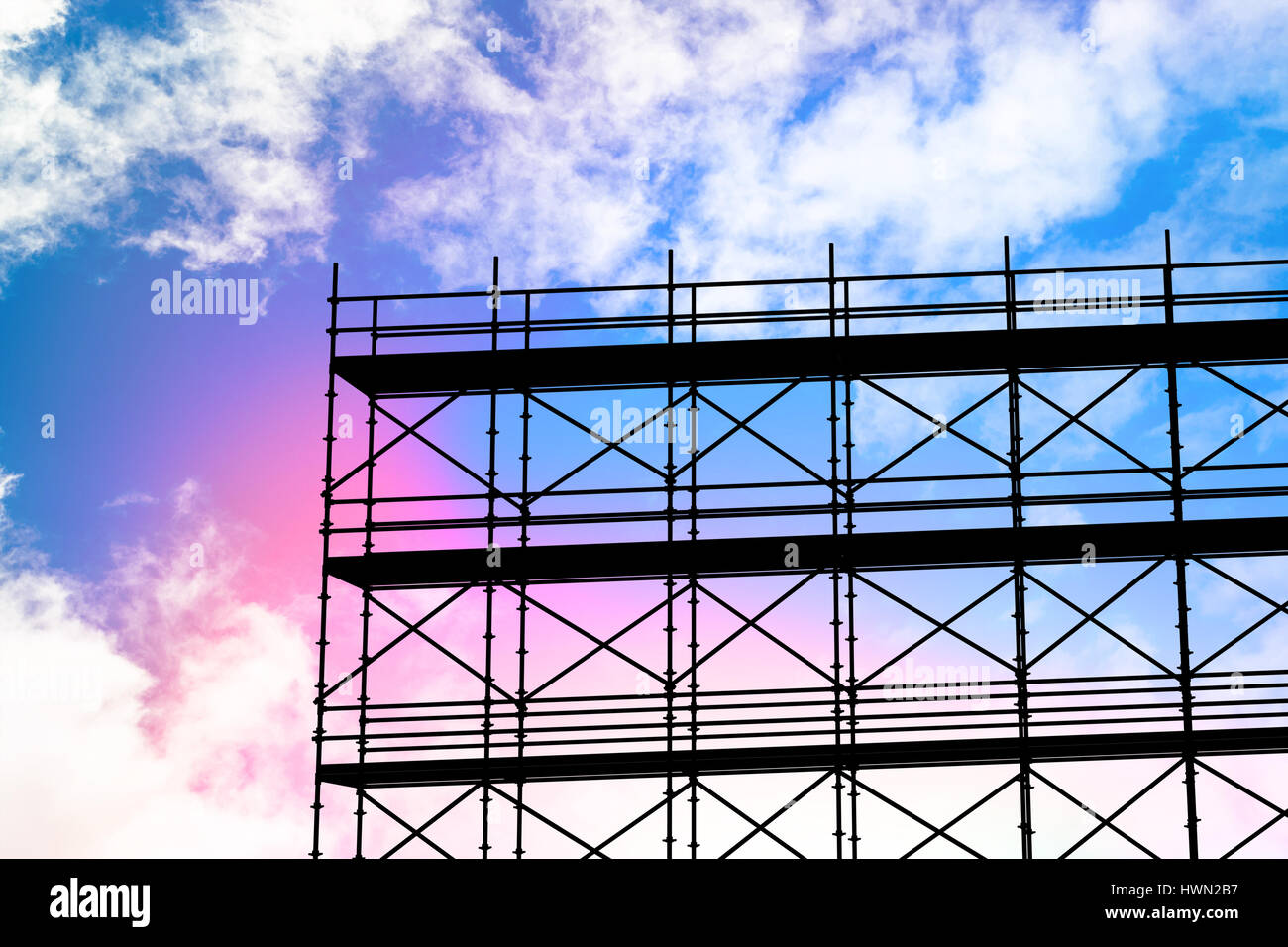 3d image of construction scaffolding against view of beautiful sky and ...