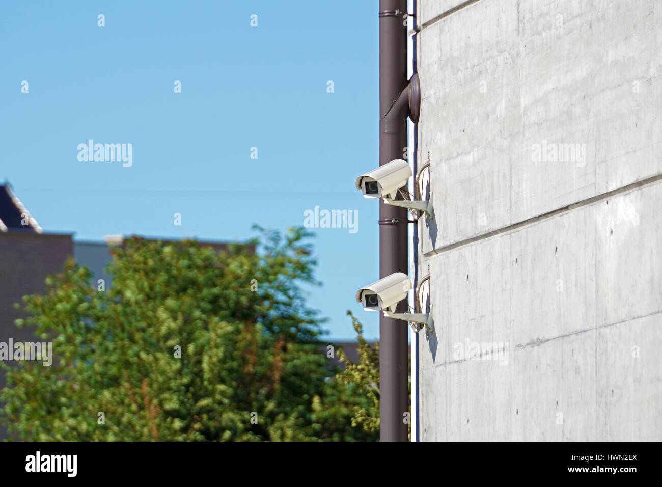 security camera on the wall Stock Photo - Alamy
