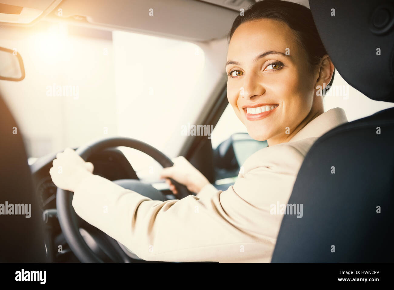 Woman driving a car Stock Photo - Alamy
