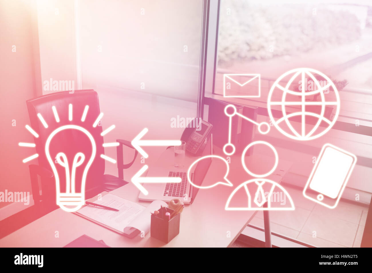 Various icons pointing towards light bulb against empty chair with ...