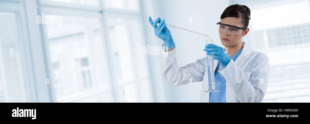 Female scientist conducting experiment against digital composite image ...