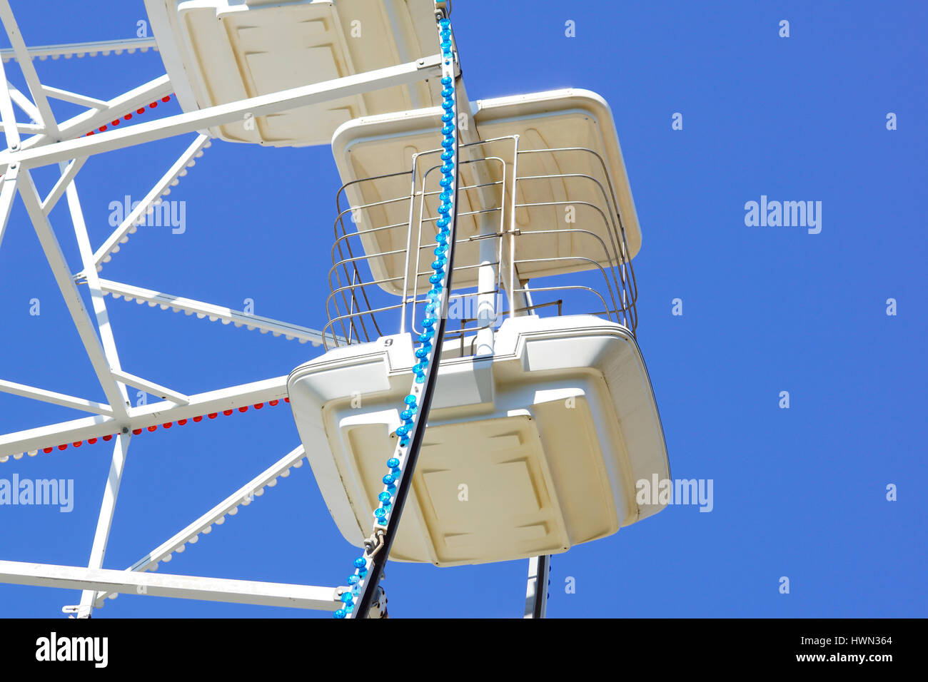 Underside view of a ferris wheel rotating downward Stock Photo - Alamy