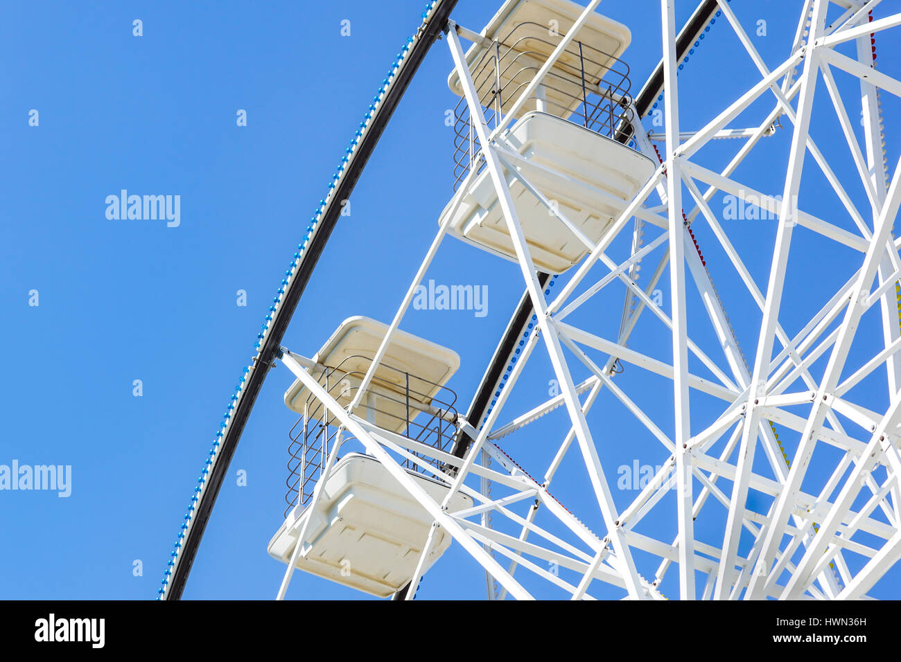 Underside view of a ferris wheel rotating downward Stock Photo - Alamy