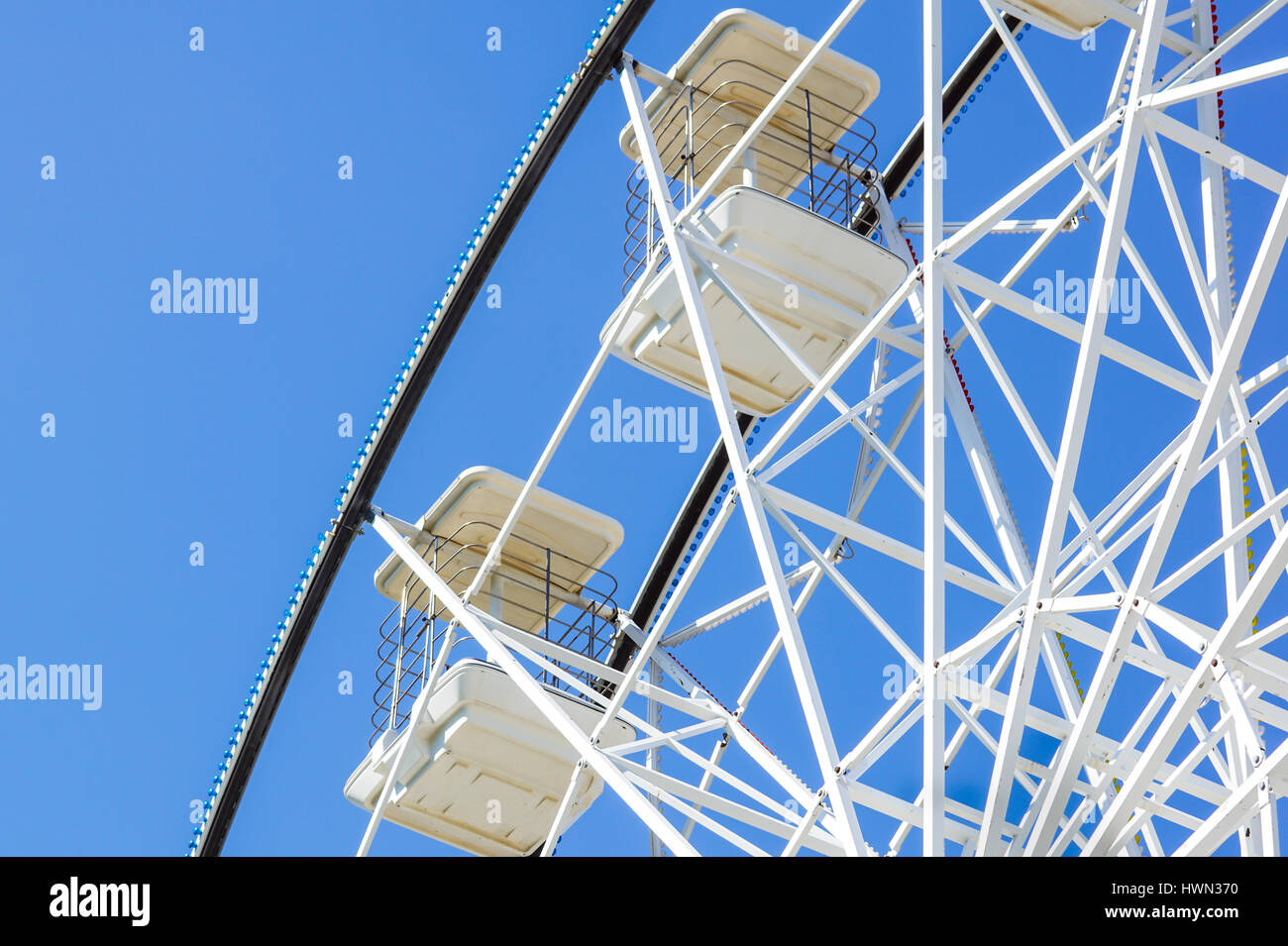 Underside view of a ferris wheel rotating downward Stock Photo - Alamy